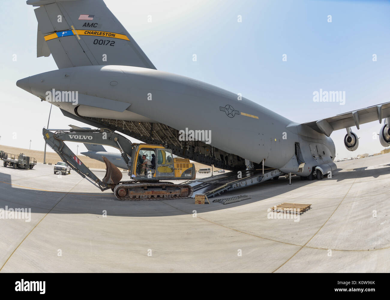 A backhoe operated by U.S. Air Force Staff Sgt. David Wakeman, airfield ...