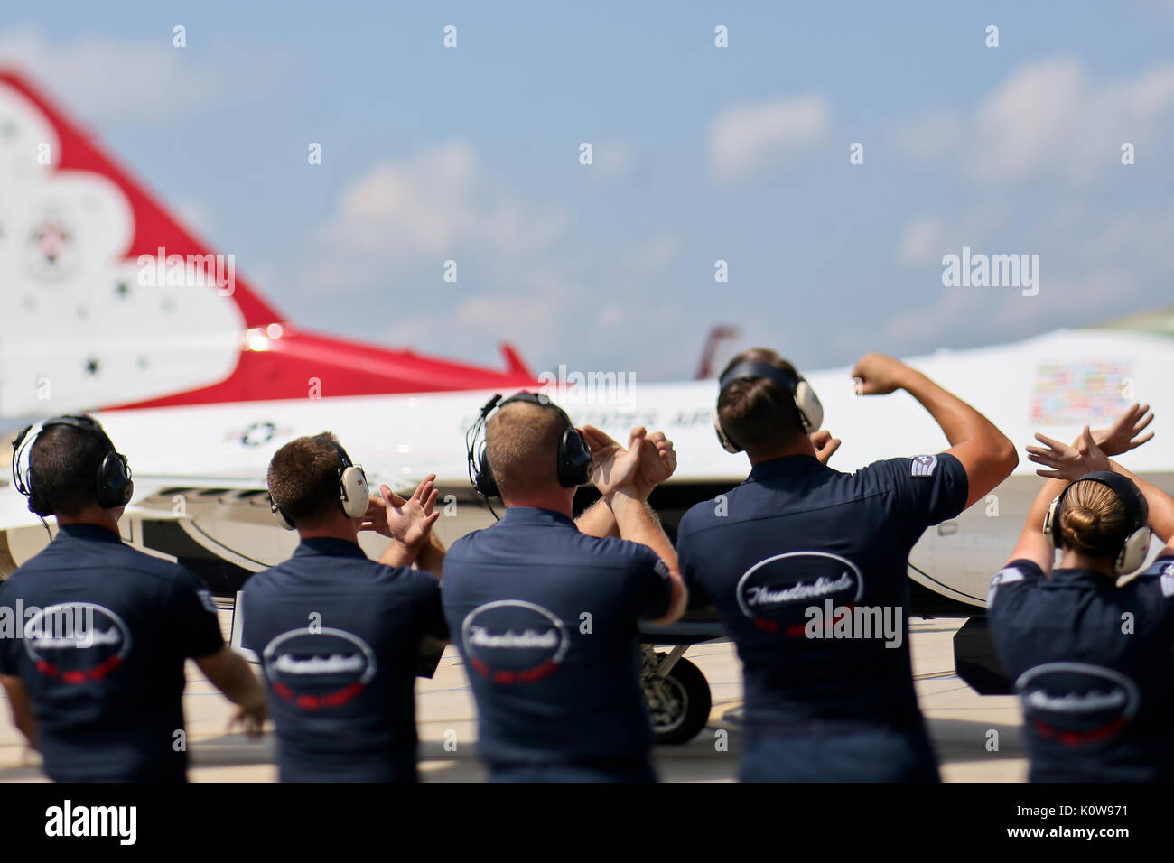U.S. Air Force Thunderbirds maintenance airmen signal to Thunderbird #1 ...