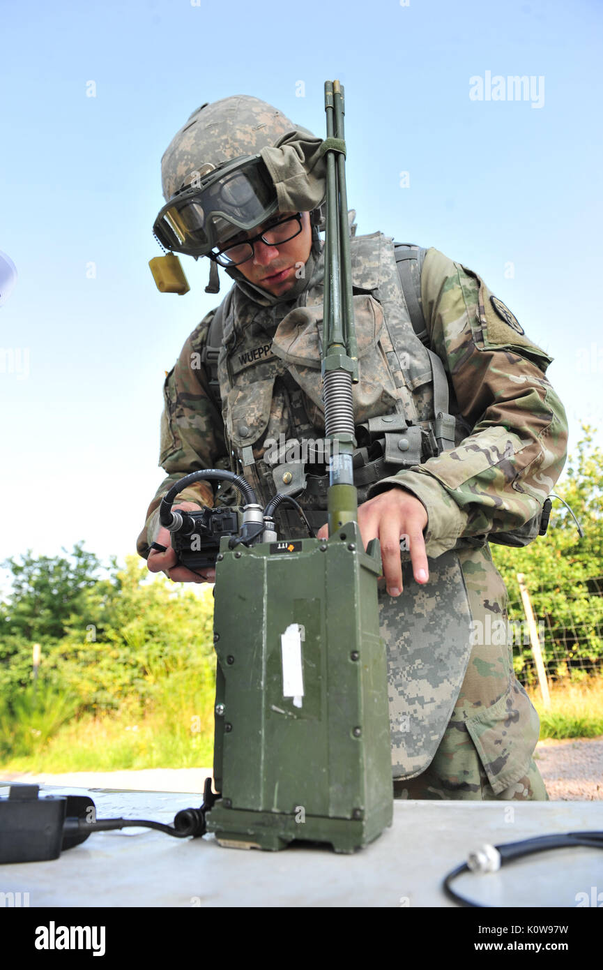 Spc. Valentin Wuepper, 21st Theater Sustainment Command, loads a ...