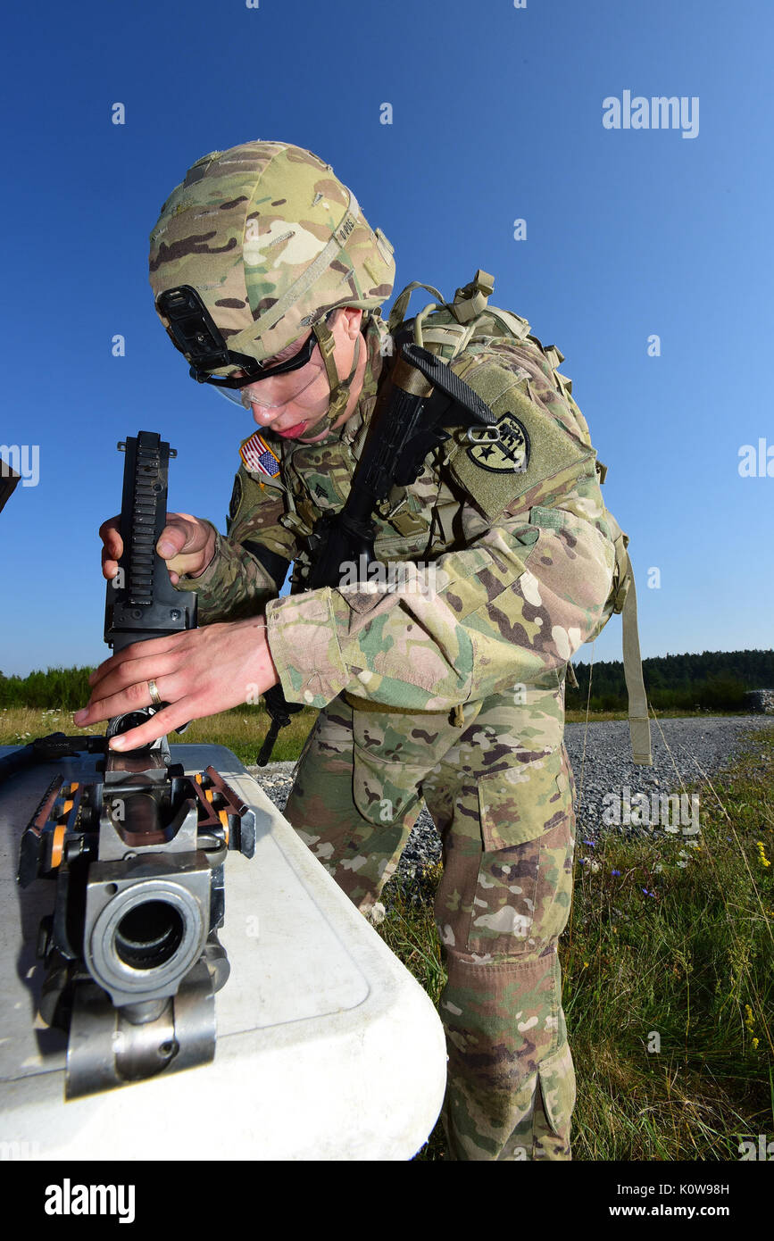 Sgt. Isaac Ryan, U.S. NATO Brigade, assembles multiple weapons to time ...
