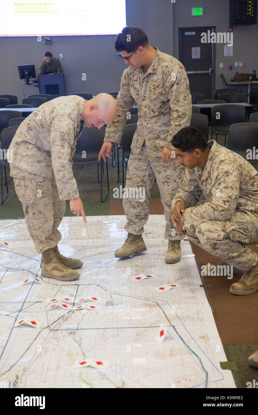 Marines ensure that objectives on the maps are accurately spaced during ...
