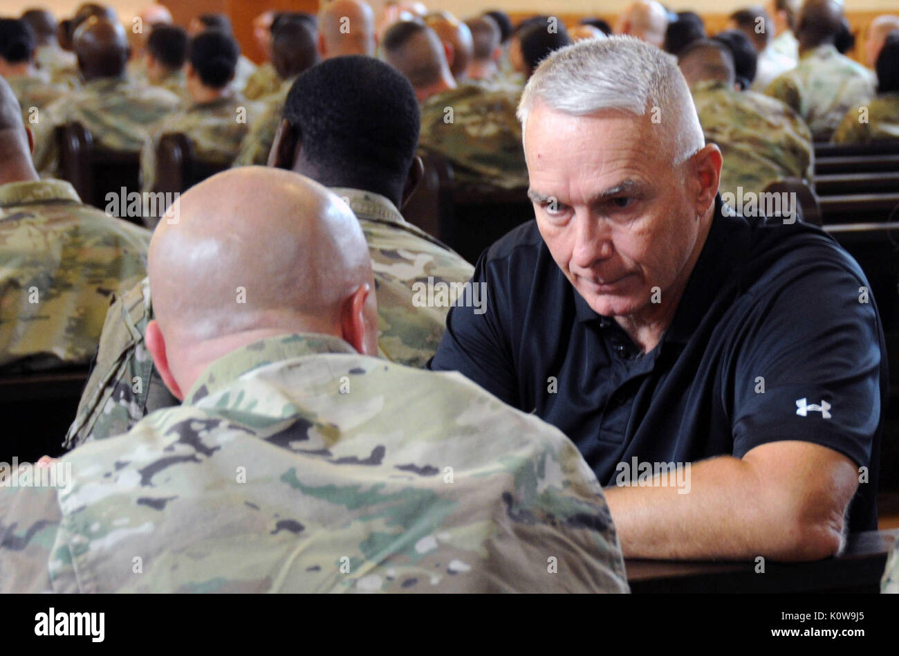 A retired command sergeant major conducts a leadership briefing for non ...
