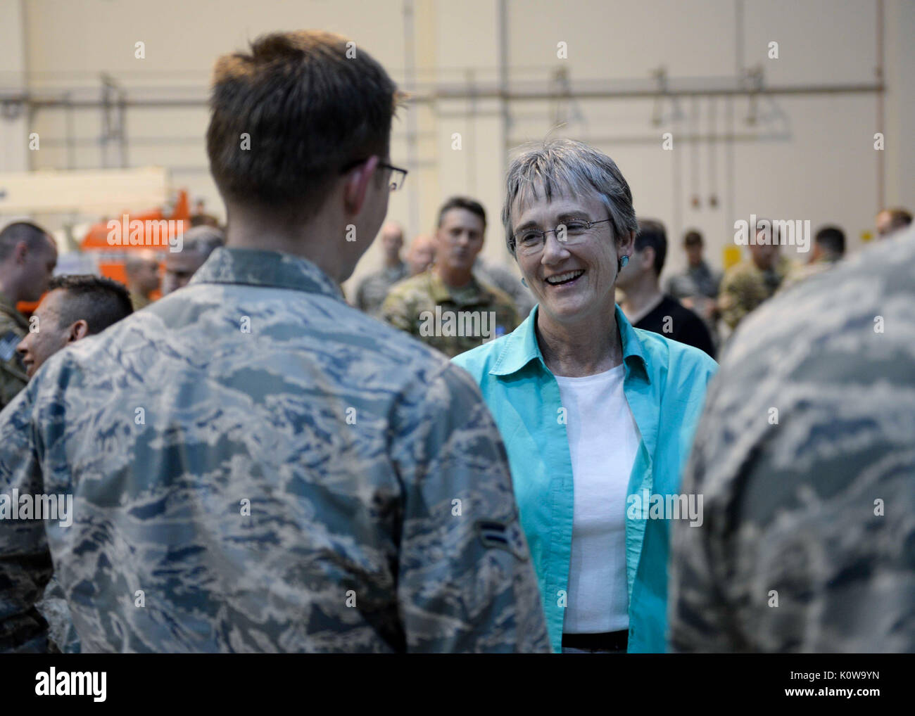 Secretary of the Air Force Heather Wilson speaks with an Airman during ...