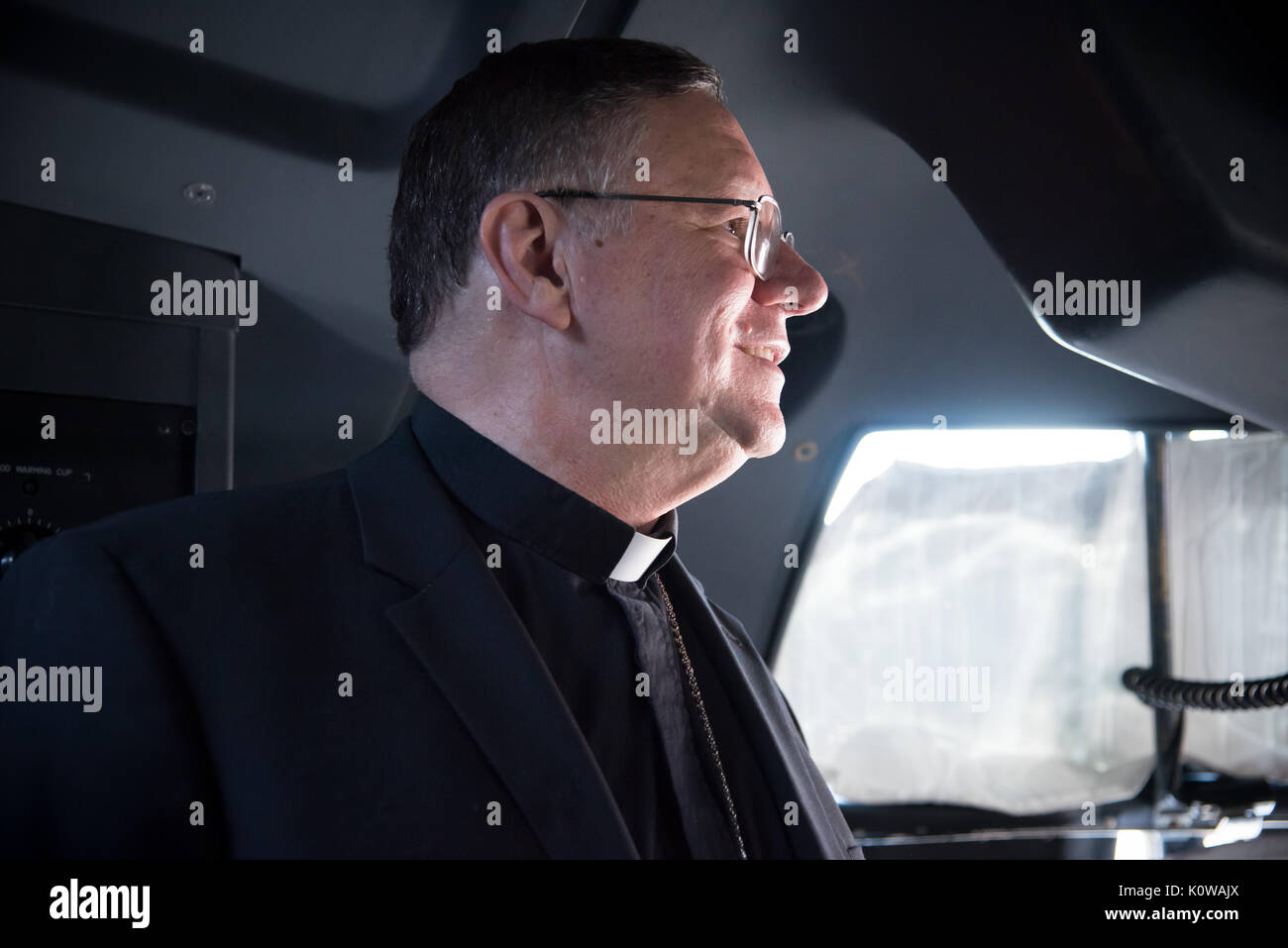 The Bishop of Biloxi, Bishop Louis Kihneman, looks around the flight ...