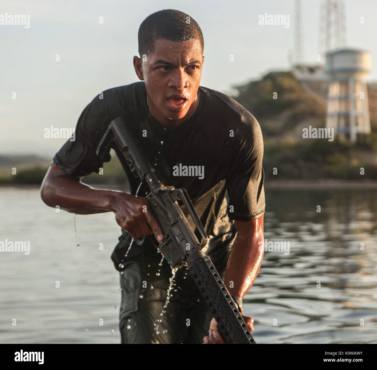 Dominican Navy commando Rafael Soto Gerònimo simulates a beach raid ...