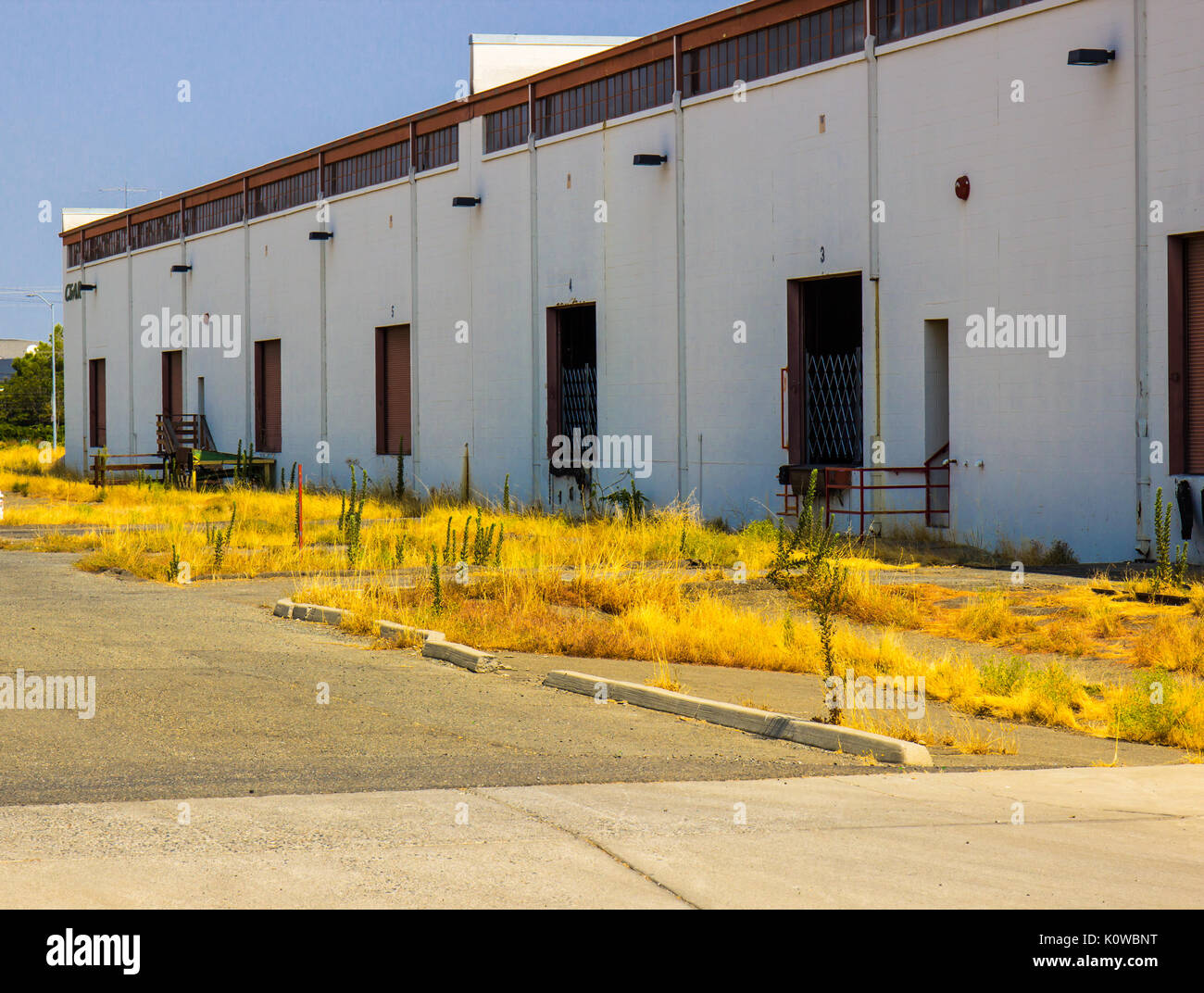 Old Abandoned Warehouse with Loading Docks Stock Photo - Alamy