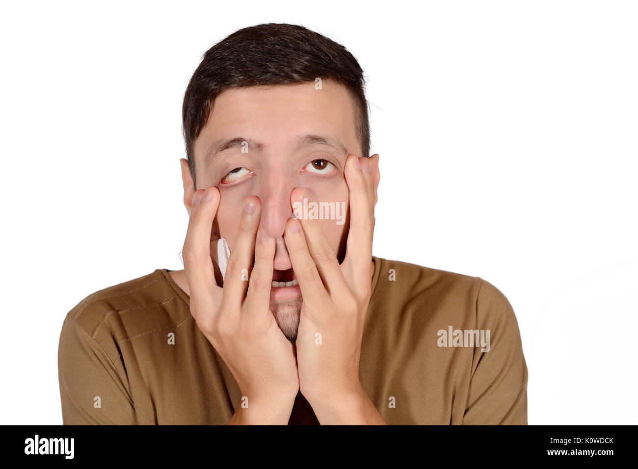 Portrait of an exhausted man. Isolated white background Stock Photo - Alamy
