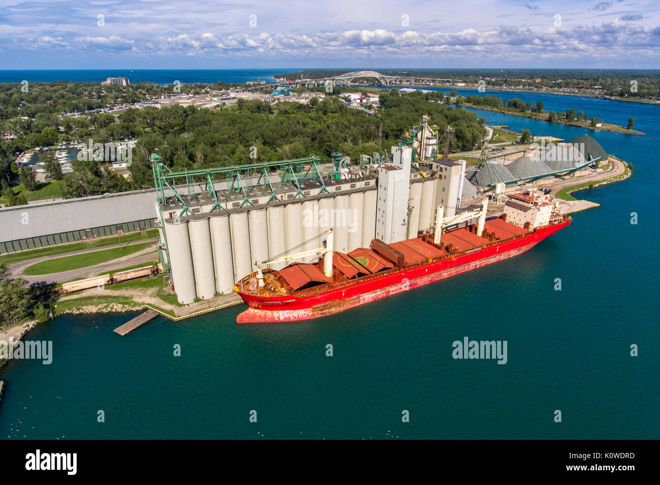 Grain ship taking on wheat at a grain elevator at Sarnia Ontarion ...