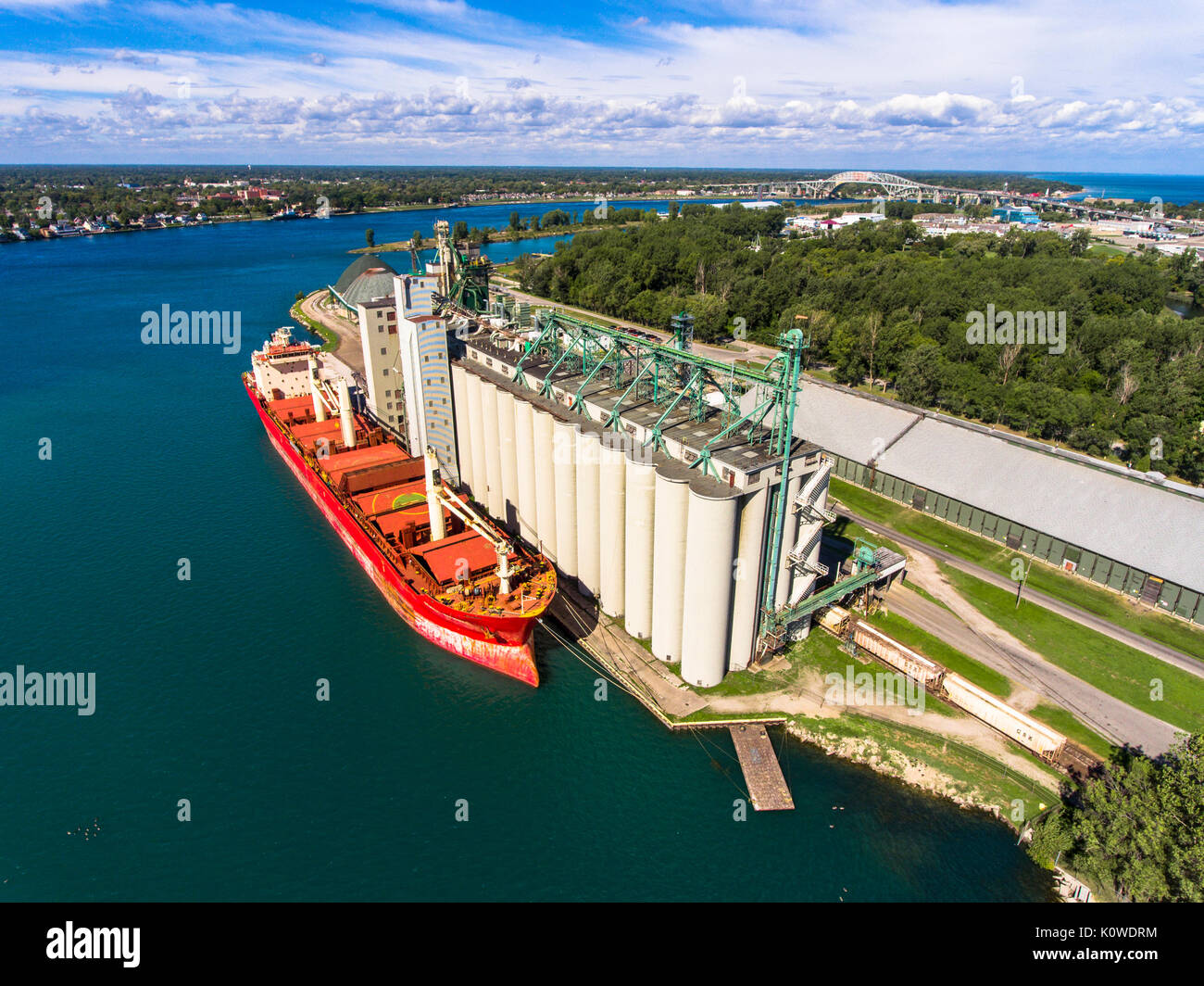 Grain ship taking on wheat at a grain elevator at Sarnia Ontarion ...
