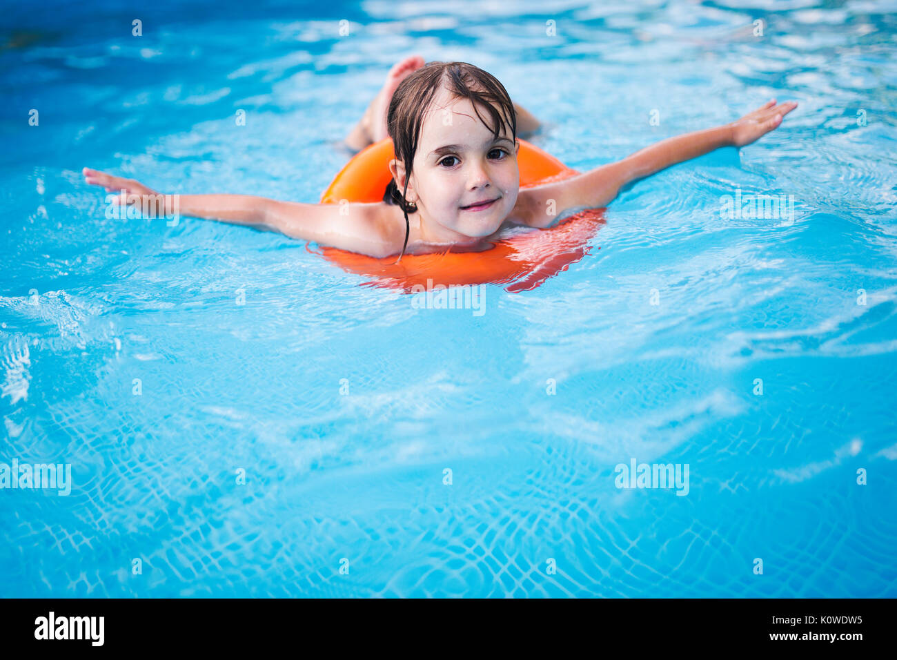 Child water float hi-res stock photography and images - Alamy