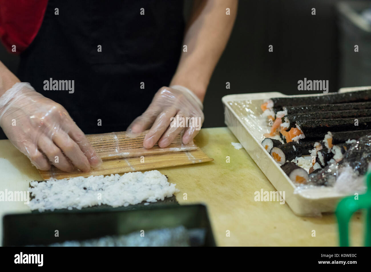 Creating sushi in Japanese restaurant Stock Photo - Alamy