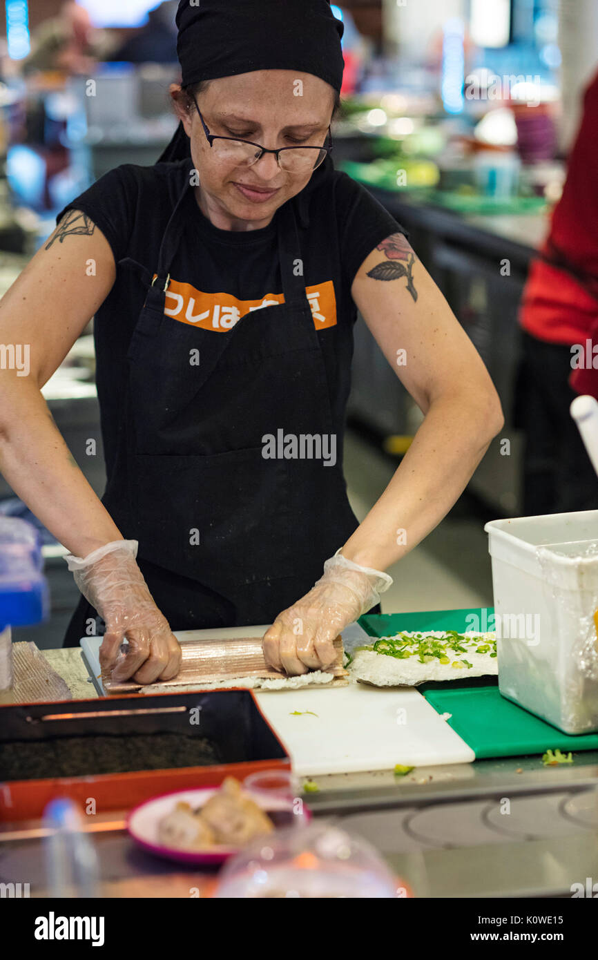 Creating sushi in Japanese restaurant Stock Photo - Alamy