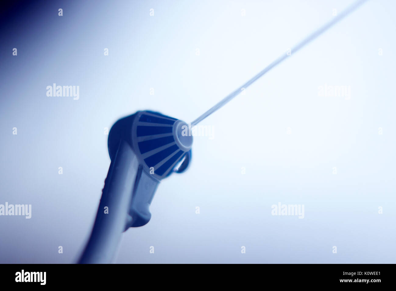 Dental water spray cleaner for interdental hygiene Stock Photo - Alamy