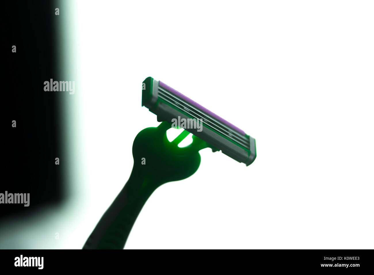 Modern safety disposable plastic shaving razor with multiple blades and ...