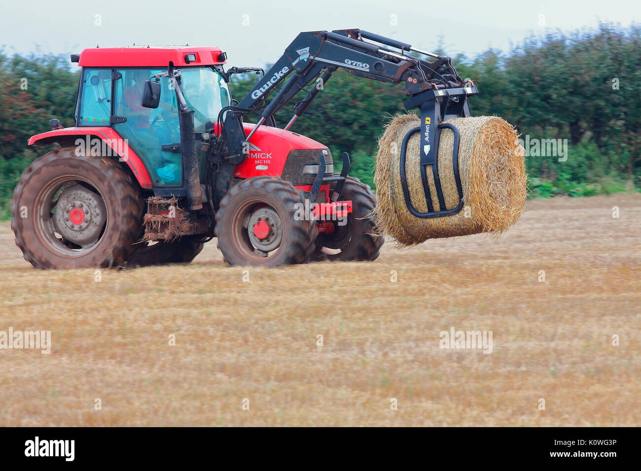 Tractor with bale lifter hi-res stock photography and images - Alamy
