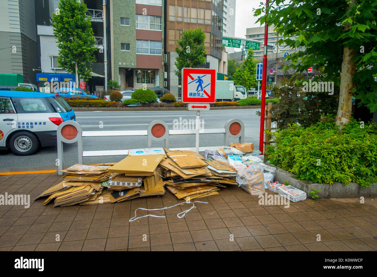 TOKYO, JAPAN JUNE 28 - 2017: Recycling area with paperboards, books ...