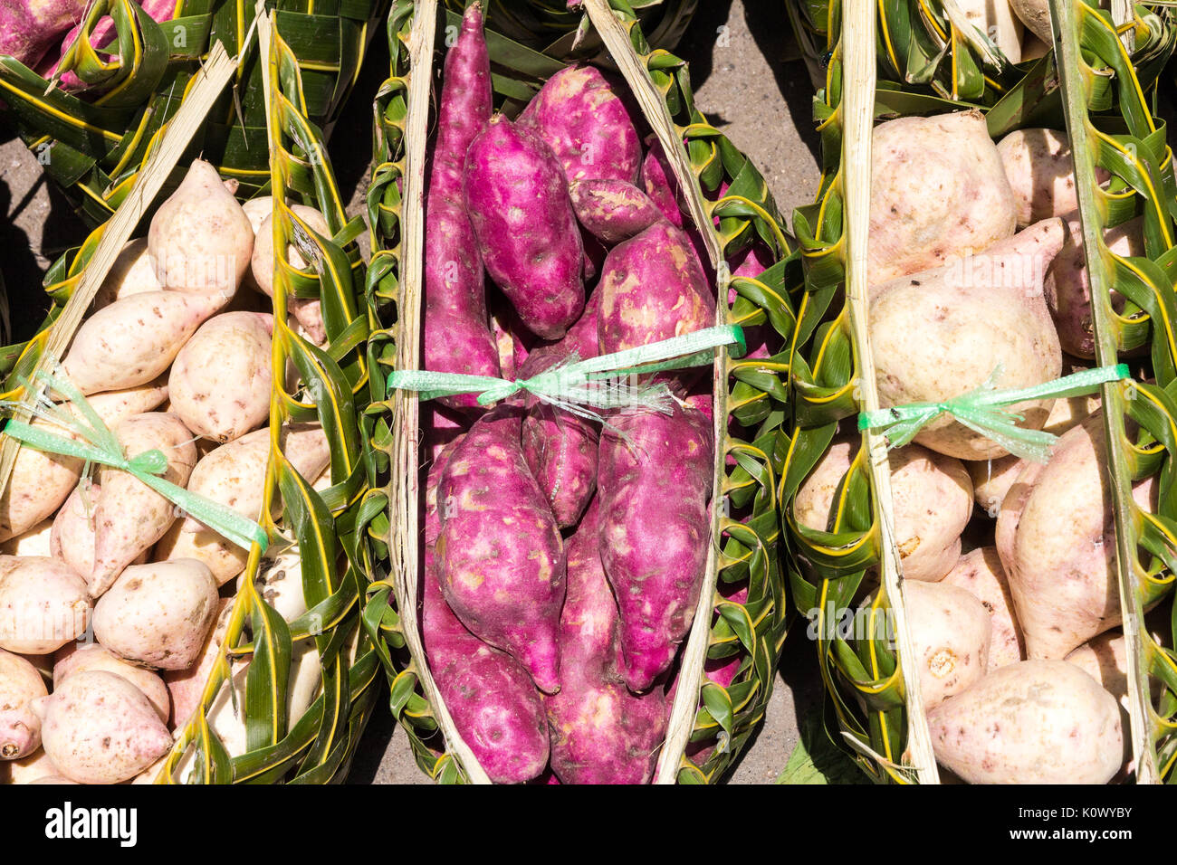 Yams in baskets for sale on Port Vila market, Vanuatu, South Pacific ...