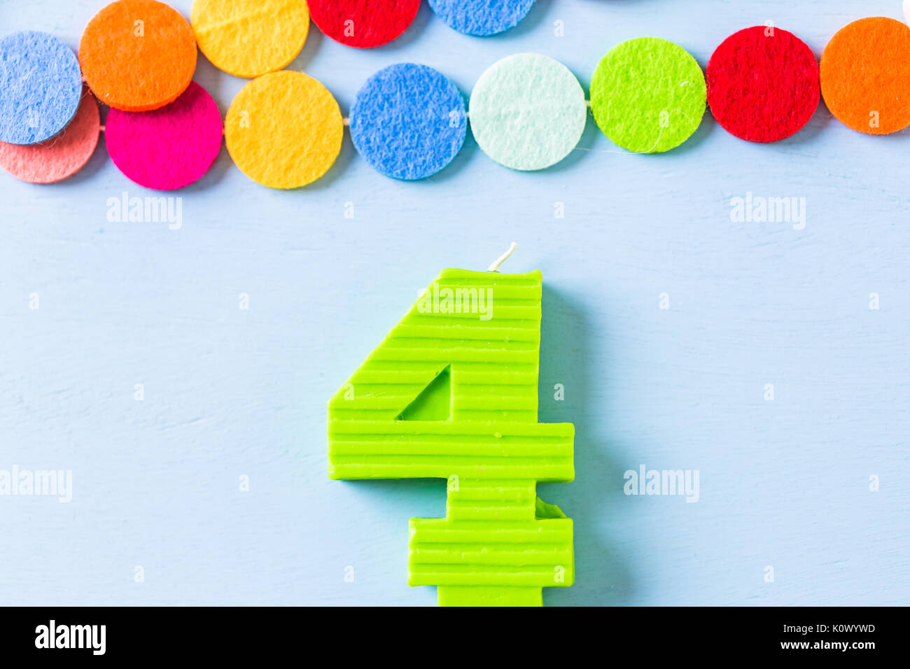 Cake candle in shape of number 4 for Birthday party Stock Photo - Alamy