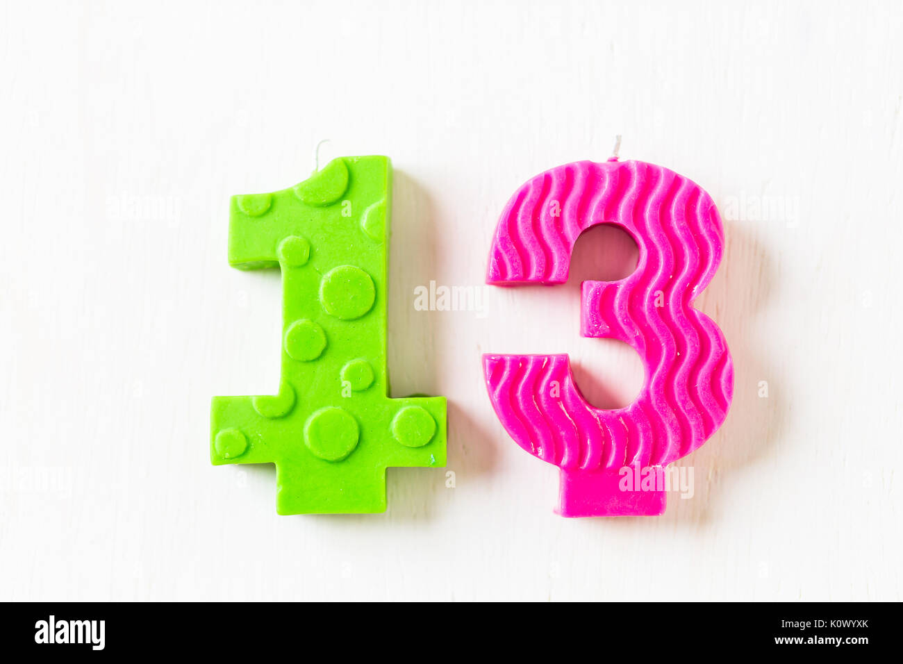 Cake candle in shape of number 13 for Birthday party Stock Photo - Alamy