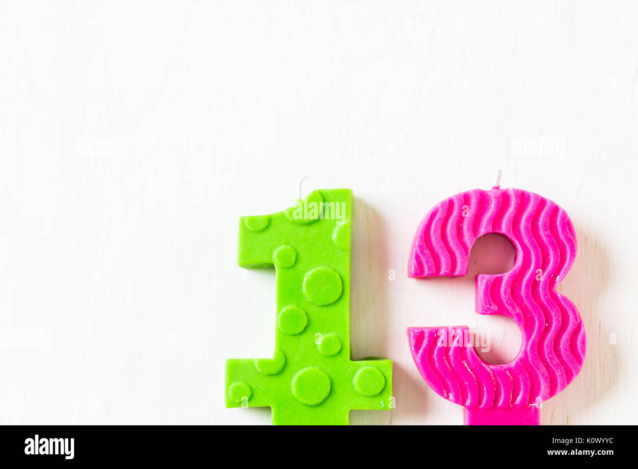 Cake candle in shape of number 13 for Birthday party Stock Photo - Alamy