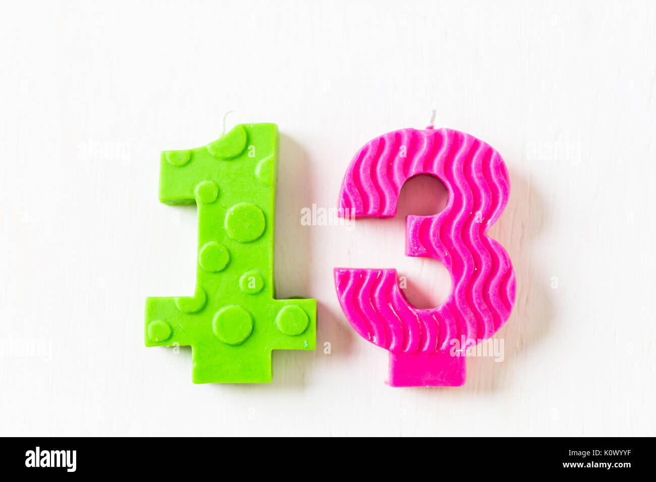 Cake candle in shape of number 13 for Birthday party Stock Photo - Alamy
