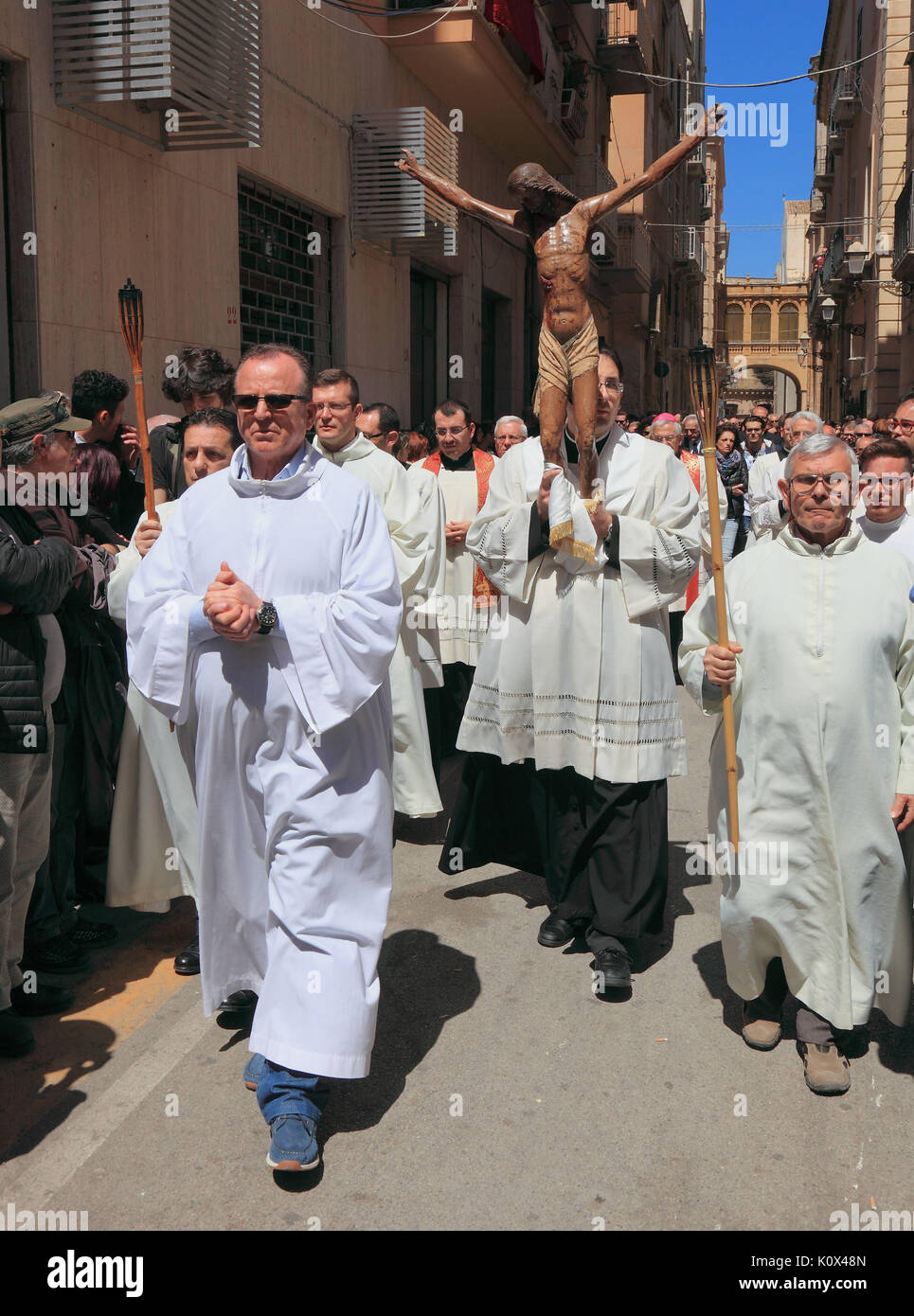 Sicily, in the old town of Trapani, groups and people during the Good ...