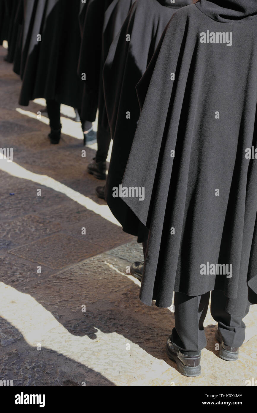 People in black clothes and black cape, Sicily, old town Trapani, Good ...