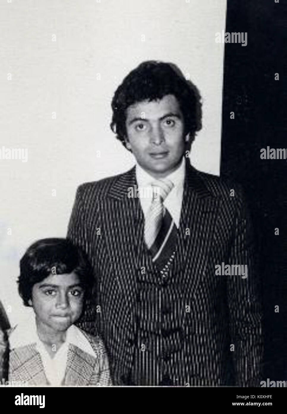 Abhishek with actor Rishi Kapoor 1978 Stock Photo - Alamy