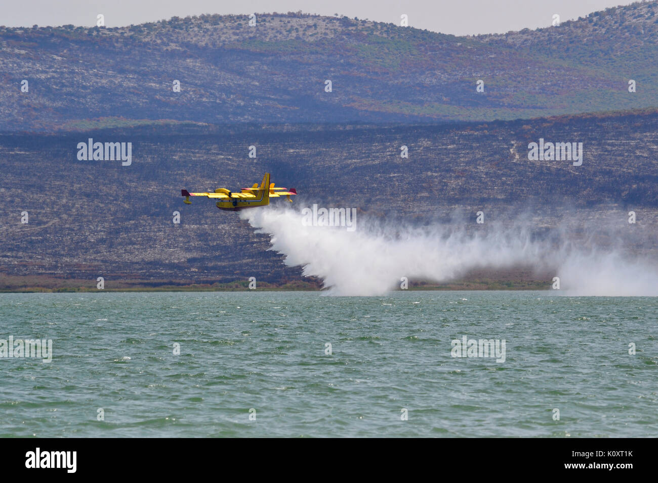 Amphibious firefighting aircraft Canadair CL-415 (Bombardier 415),Lake ...