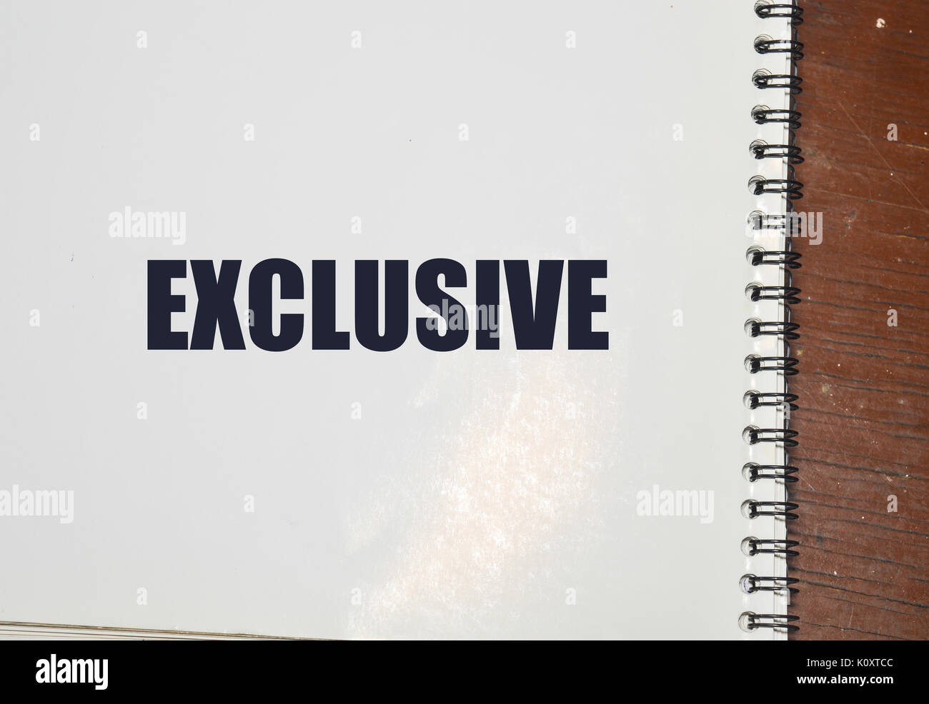 exclusive written on white paper, business concept background Stock ...