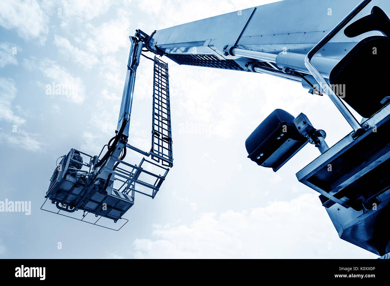 Fire fighter in tall and long crane Stock Photo - Alamy