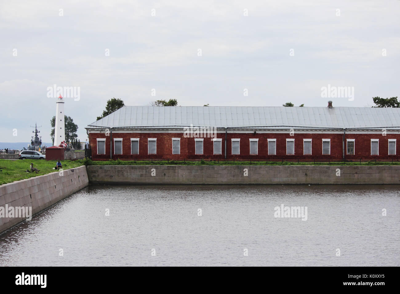 A canal with water for seaworthy ships calling. Stone historical ...