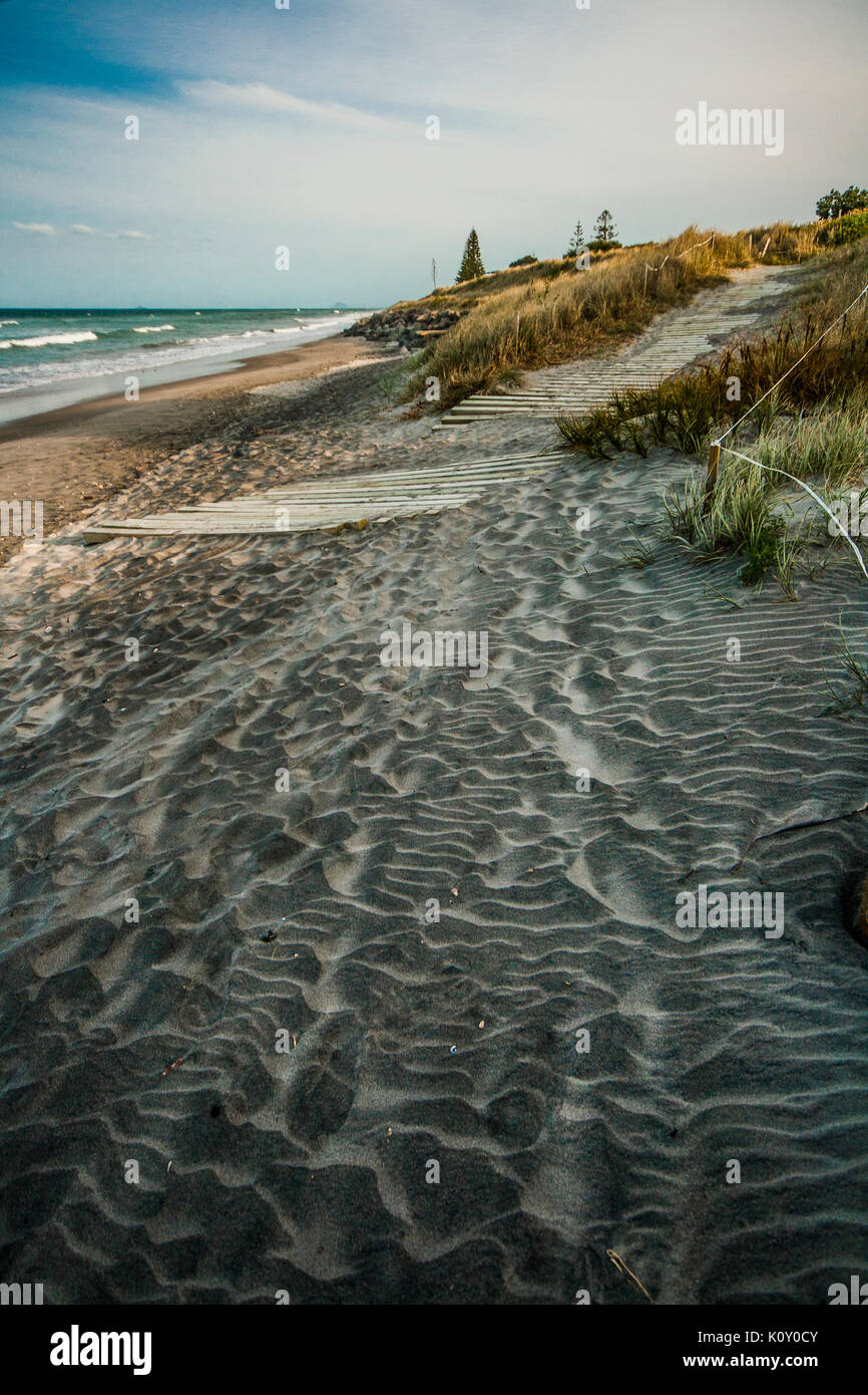 Beach in the evening Stock Photo - Alamy