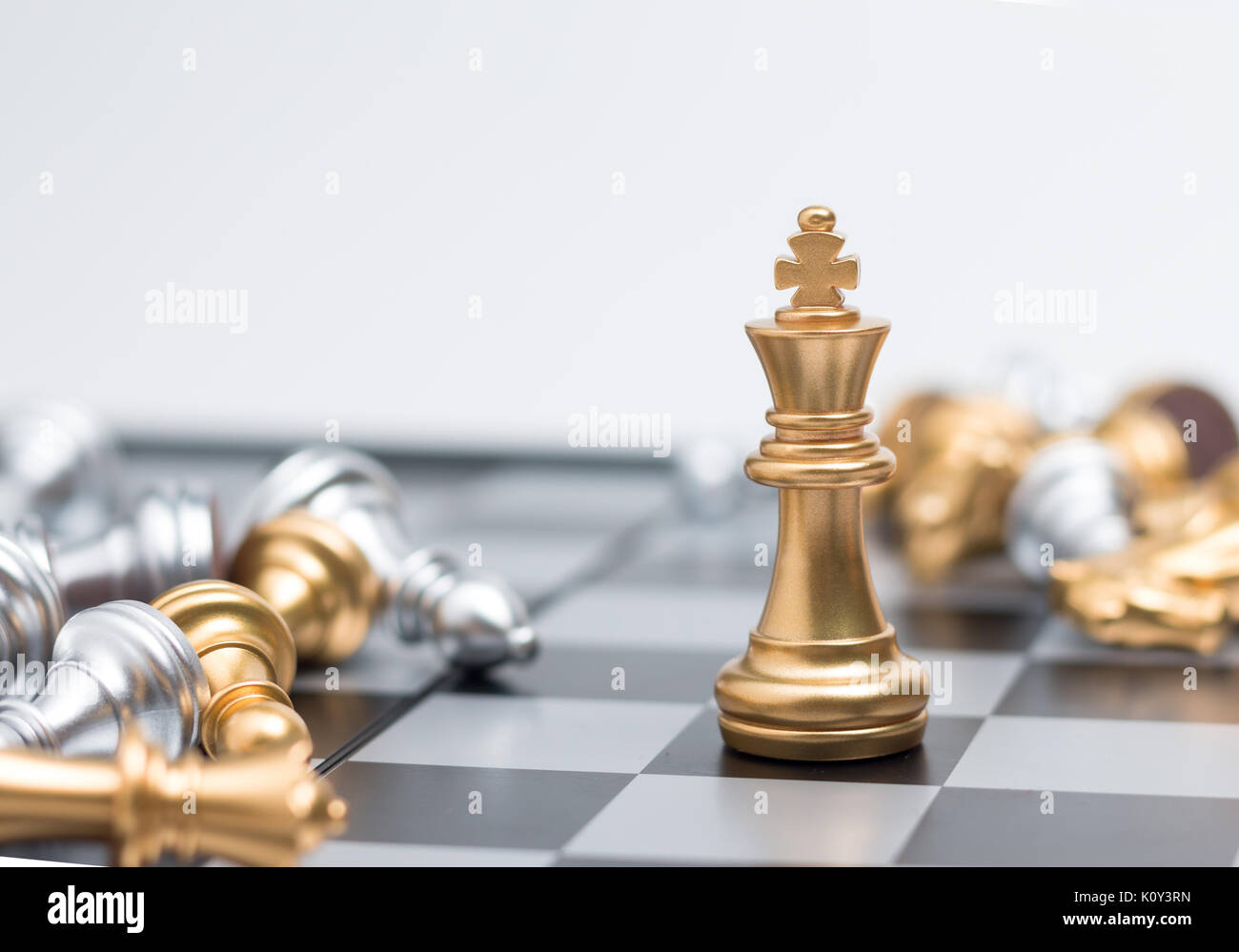 Gold Chess on chess board game for business metaphor leadership concept ...