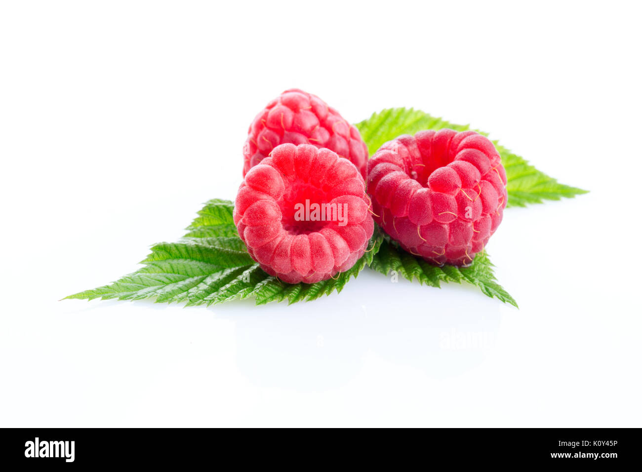 red raspberry isolated on white background Stock Photo - Alamy