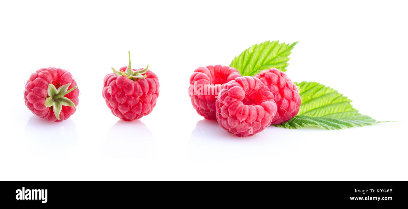 three raspberry isolated on white background Stock Photo - Alamy