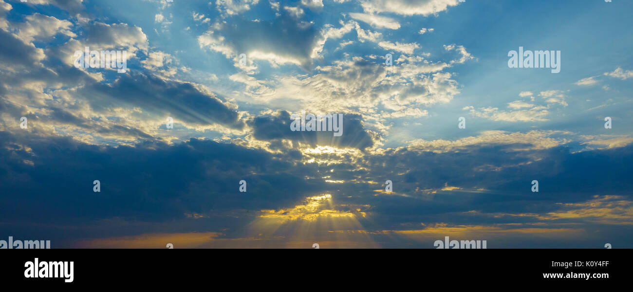 Dramatic skies with sun rays Stock Photo - Alamy