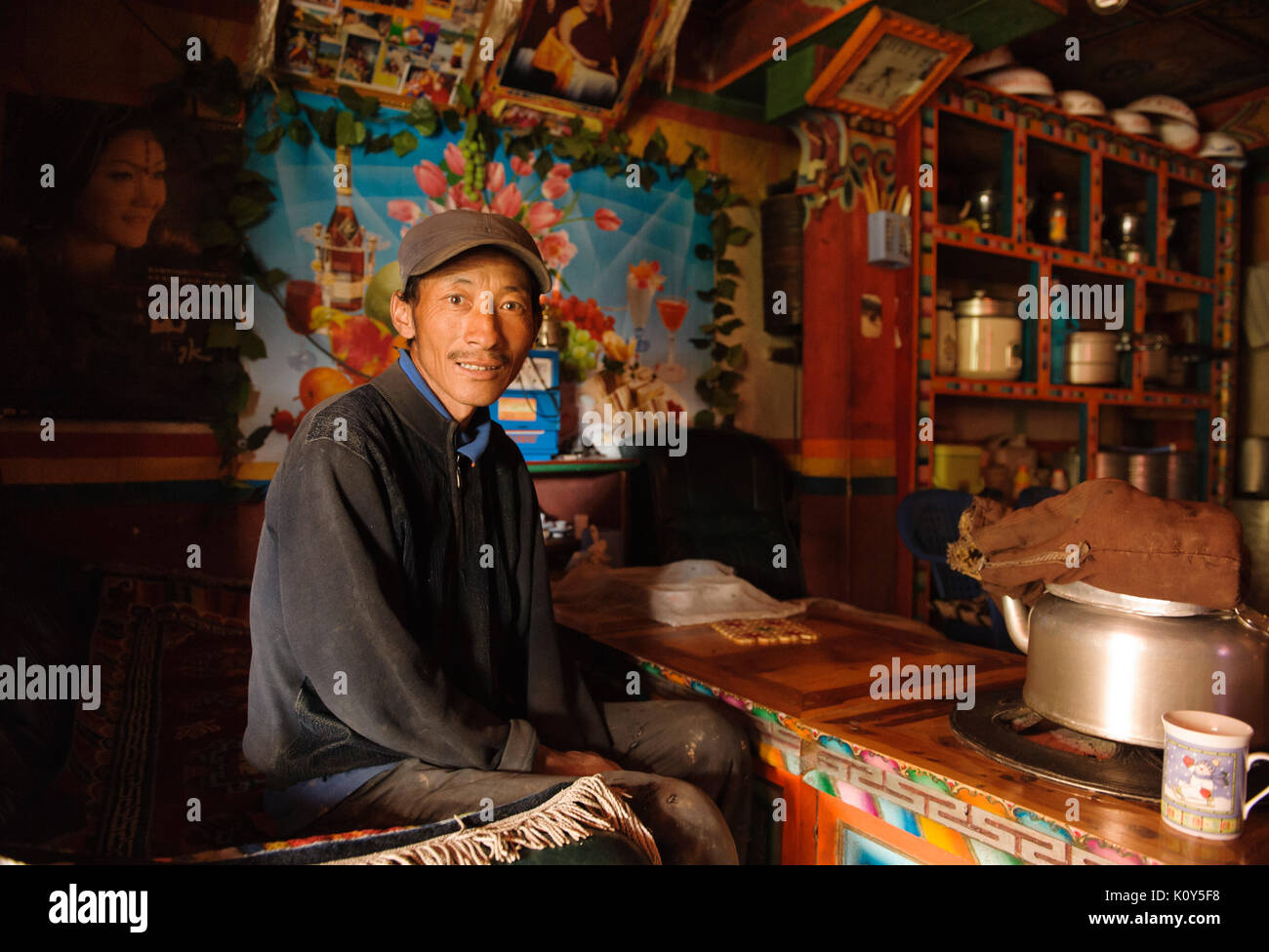 Tibetan man in his traditional home Stock Photo - Alamy