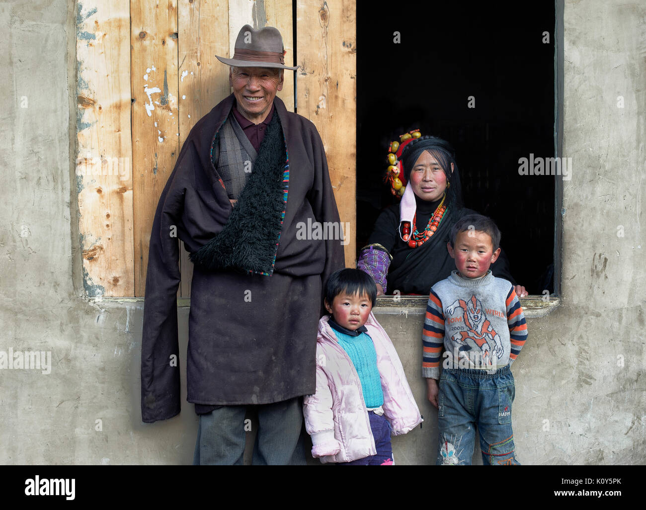 Tibetan family in their home, Tibetan Plateau Stock Photo - Alamy