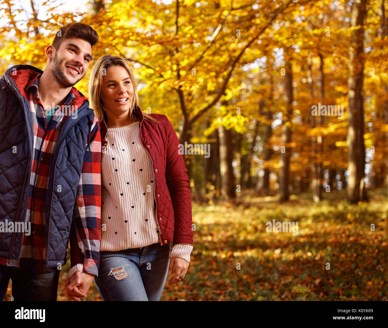 love in the autumn park- happy romantic couple Stock Photo - Alamy