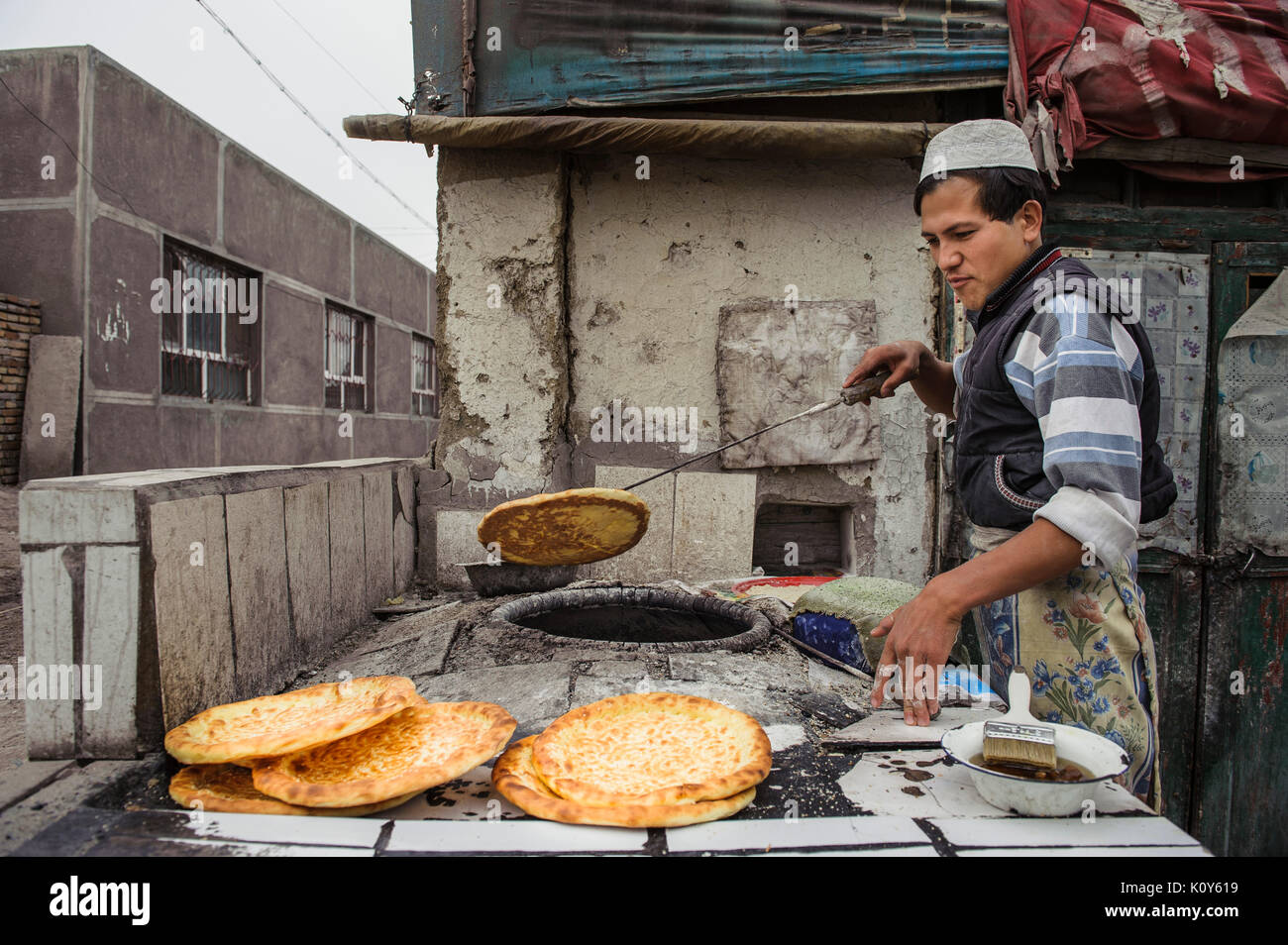 Uyghur man eating hi-res stock photography and images - Alamy