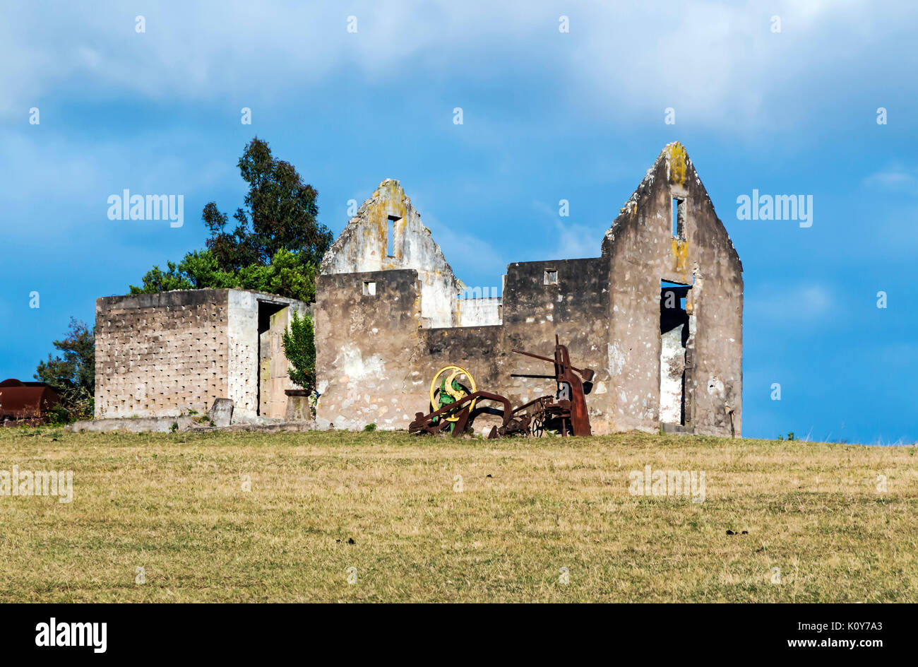Rural old abandoned derelect farm building on dry winter landscape ...