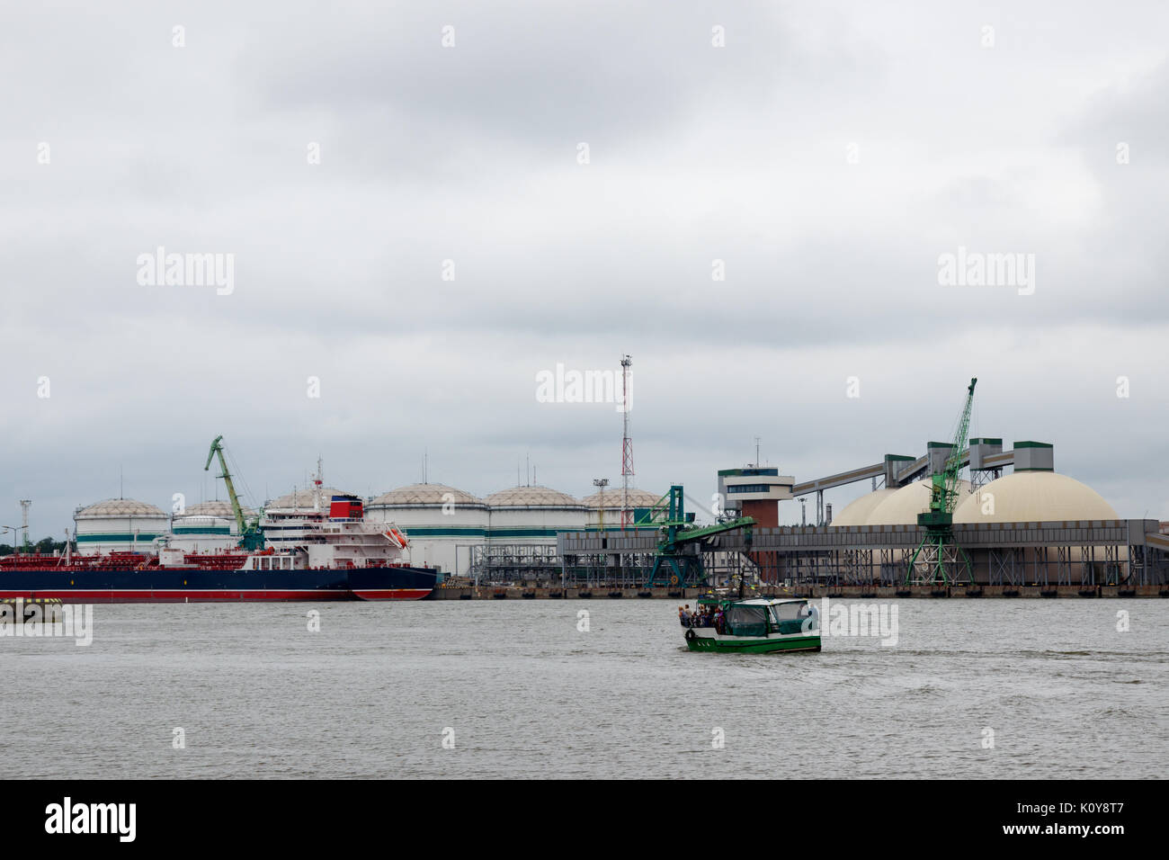 Port landscape. View of the industrial port. The sea, port cranes and ...