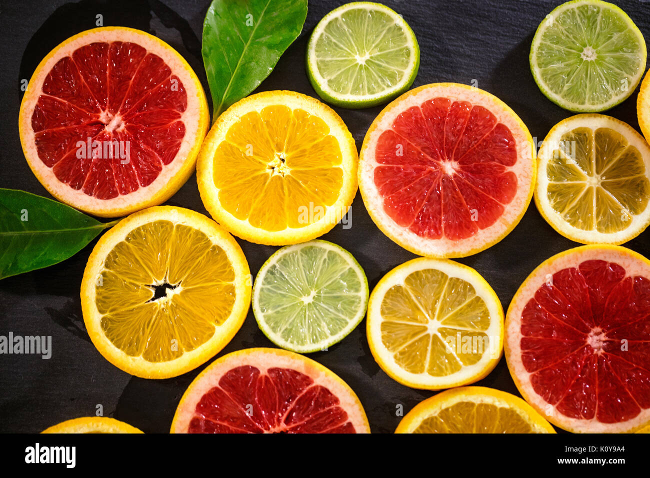 fruit background from various slices of citrus close-up Stock Photo - Alamy