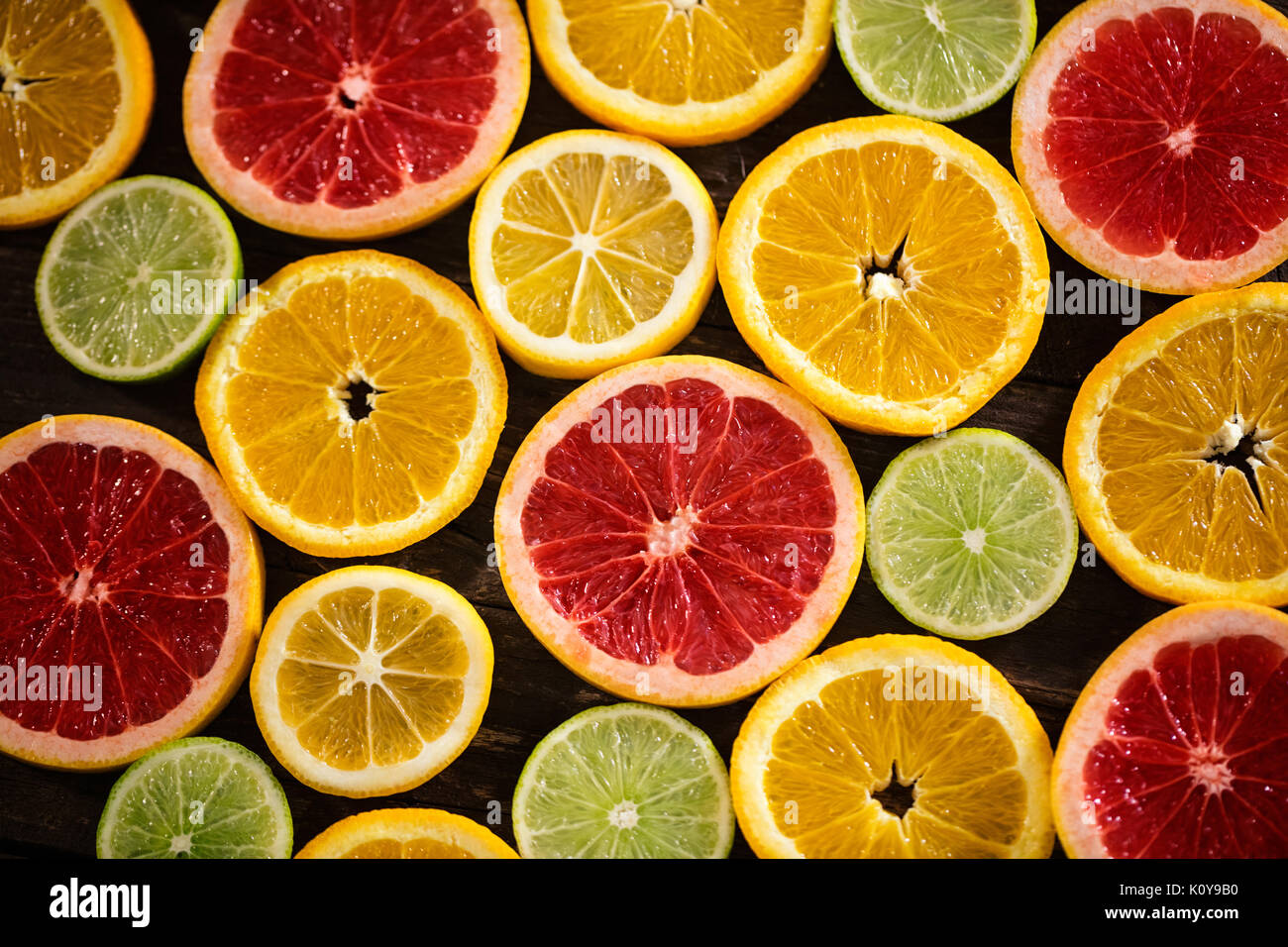 fresh fruit background from various slices of citrus close-up Stock ...