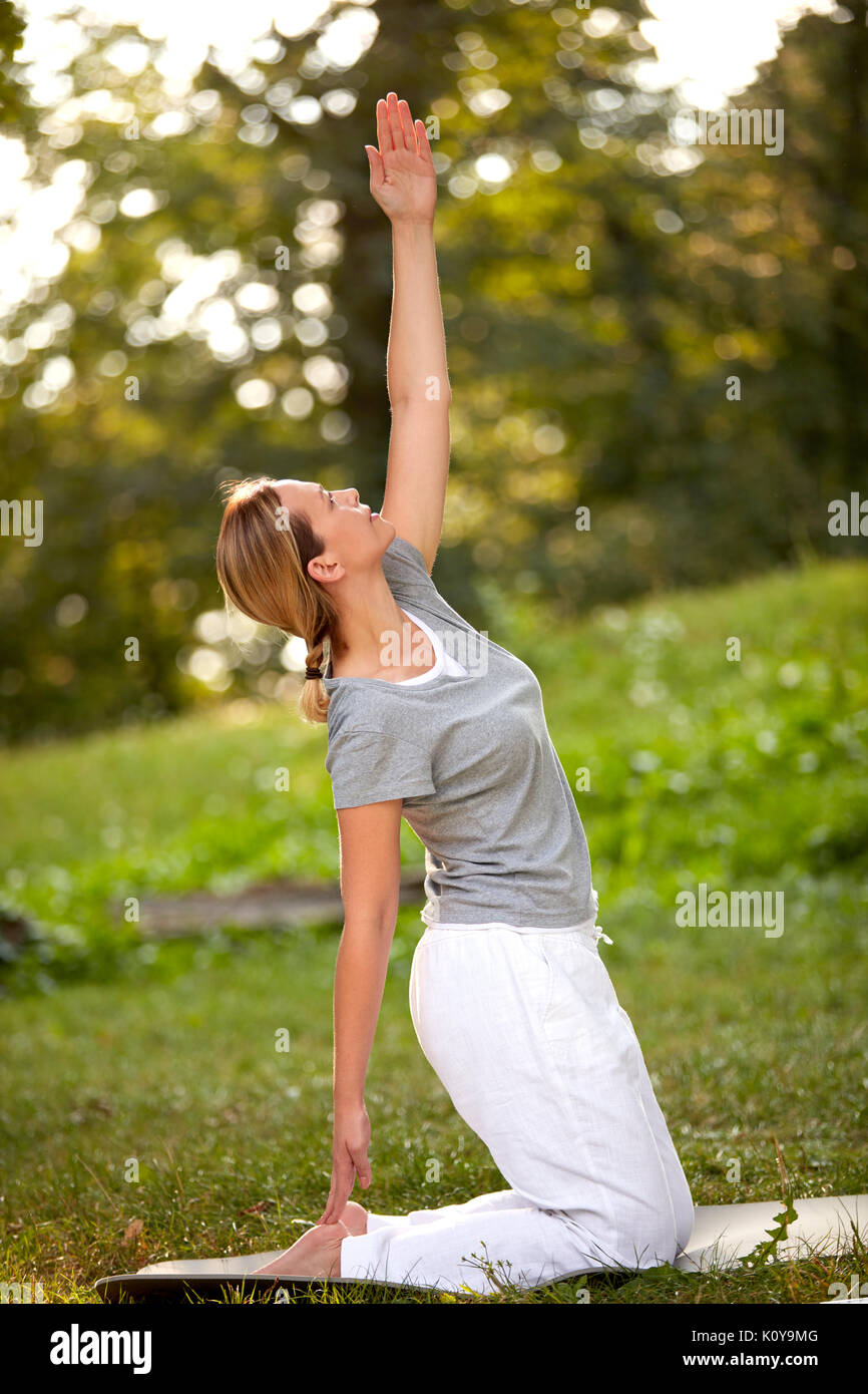 Doing physical exercises hi-res stock photography and images - Alamy