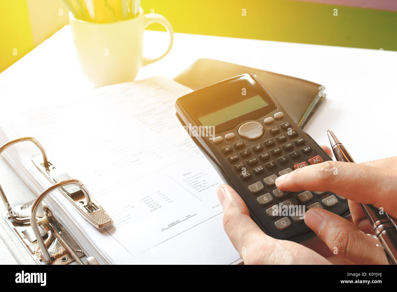 close up of man with calculator counting making notes in the crisis at ...