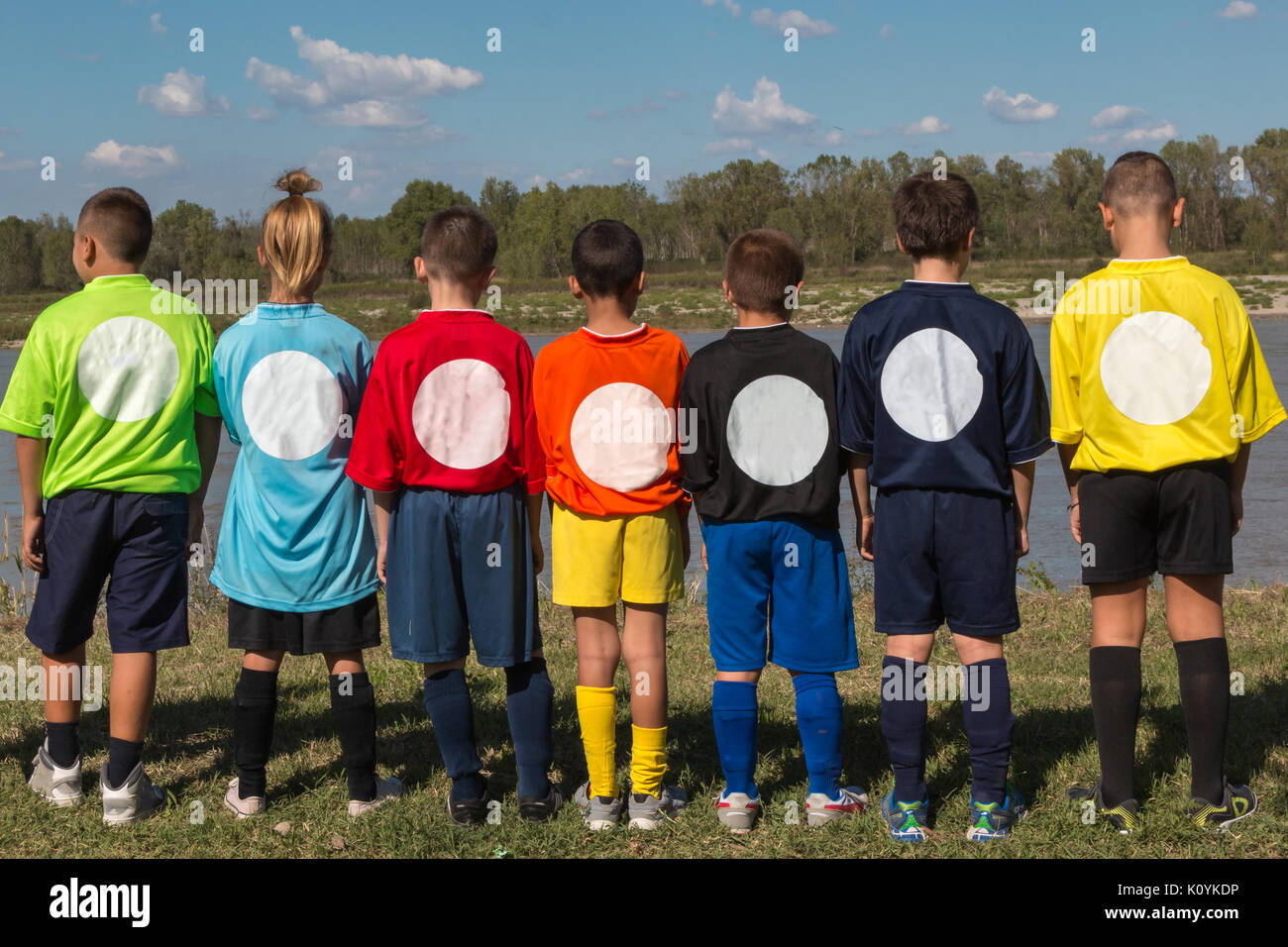Children in Line Back Turned with Shirts with Different Colors on the ...