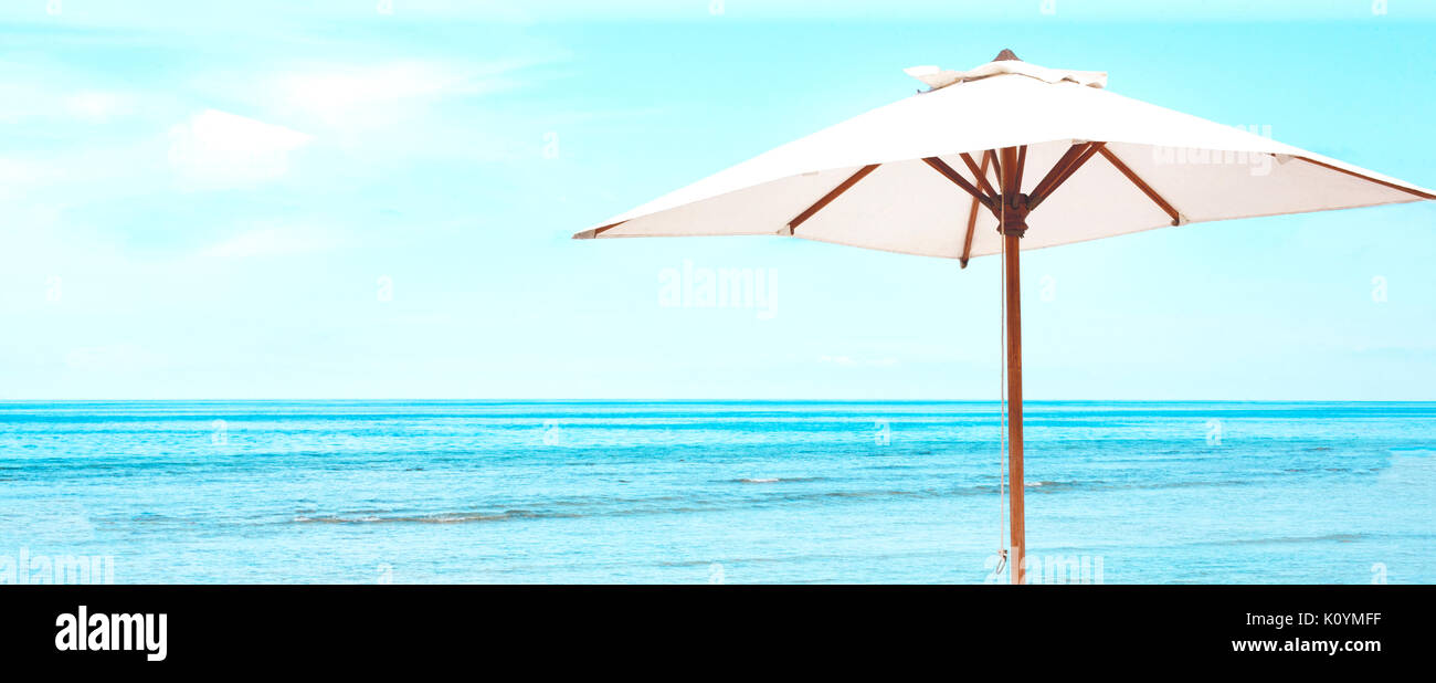 Beach sun parasol hi-res stock photography and images - Alamy