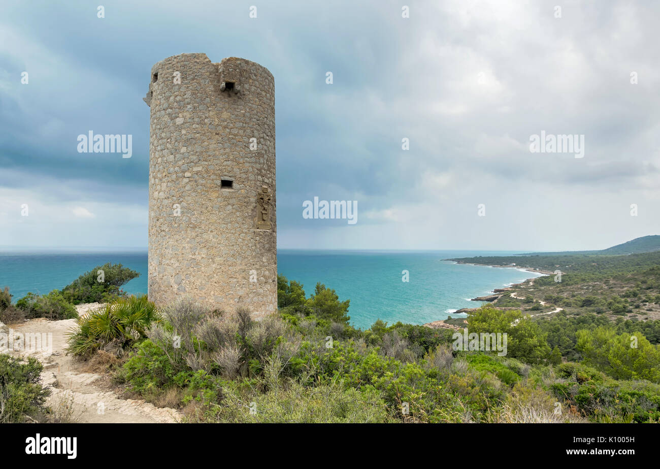 Watchtower on a cliff in the sea Stock Photo - Alamy